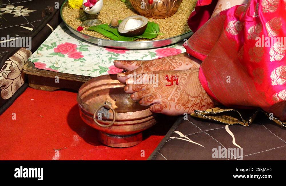 Hindu Swastik Symbol on a bride legs in marriage ritual. Marathi ...
