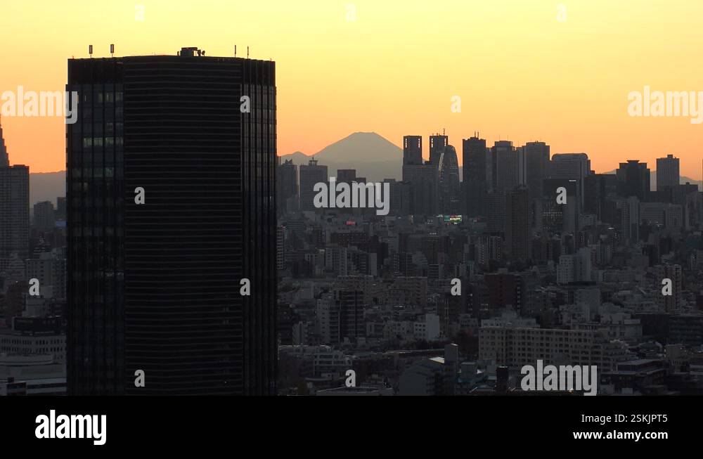 TOKYO, JAPAN : Aerial time lapse sunset view of TOKYO and MOUNT FUJI ...