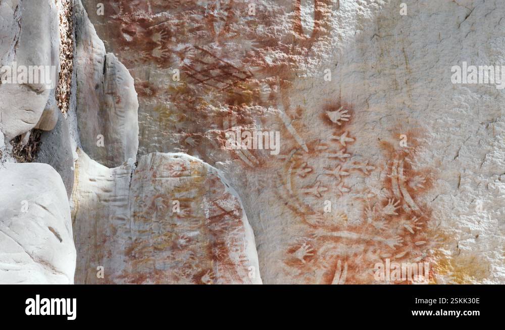 Ochre stencils and free-hand cave paintings created by the first ...