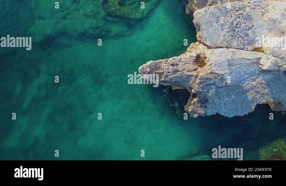 Experience an awe-inspiring drone perspective of a peaceful beach! The ...