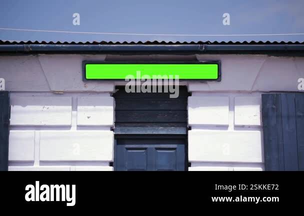 Storefront with Green Screen Shop Sign for Custom Content - Zoom In ...