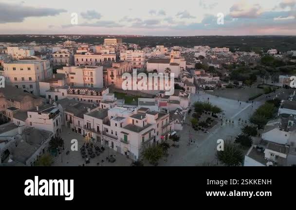 flight over the center of Alberobello. city is famous not only for ...