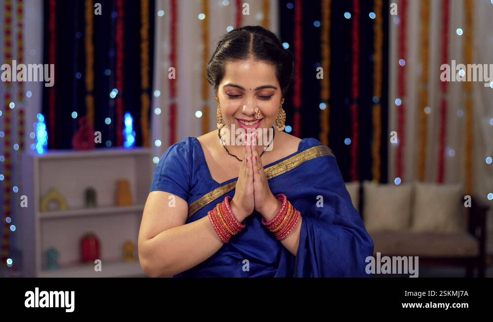 Beautiful Indian woman greeting with namaste gesture - Indian greeting ...