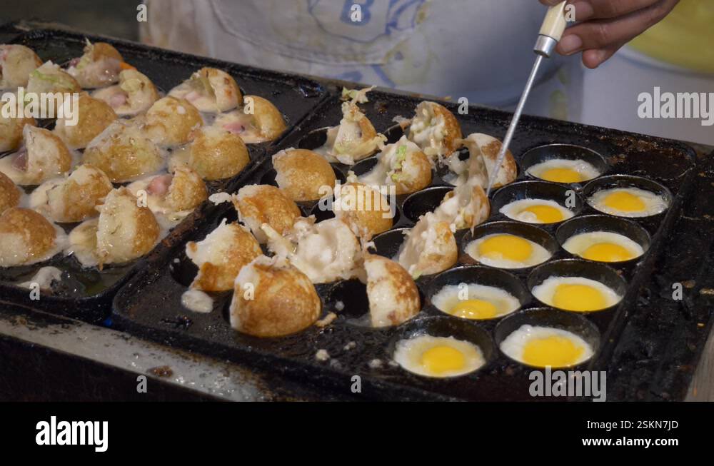 thailand night market street food booth cooking squid octopus ...