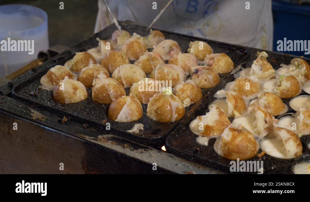 thailand night market street food booth cooking squid octopus ...