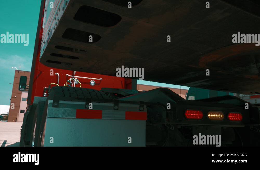 semi american truck bobtail backing up to couple the fifth wheel with ...