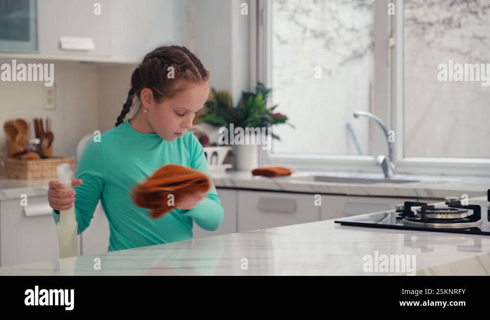 Girl Wiping Table with Rag and Detergent at Kitchen Stock Video Footage ...