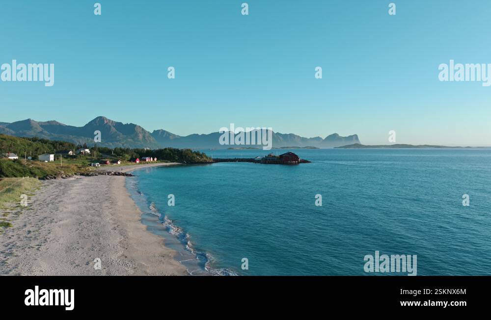Sandy Shoreline Of Bostranda Beach With Calm Blue Sea In Bovaer ...