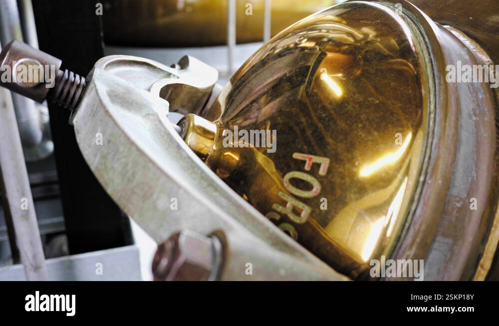 Closeup of Copper golden manhole cover in a Whisky Distillery made by ...