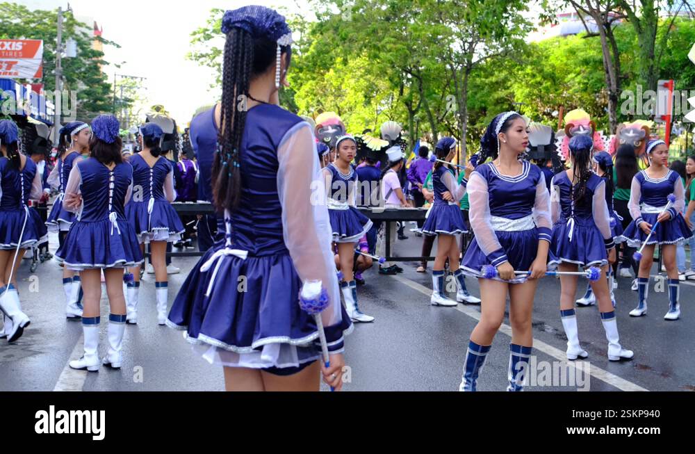 A large crowd of young children wearing blue and white uniforms in ...