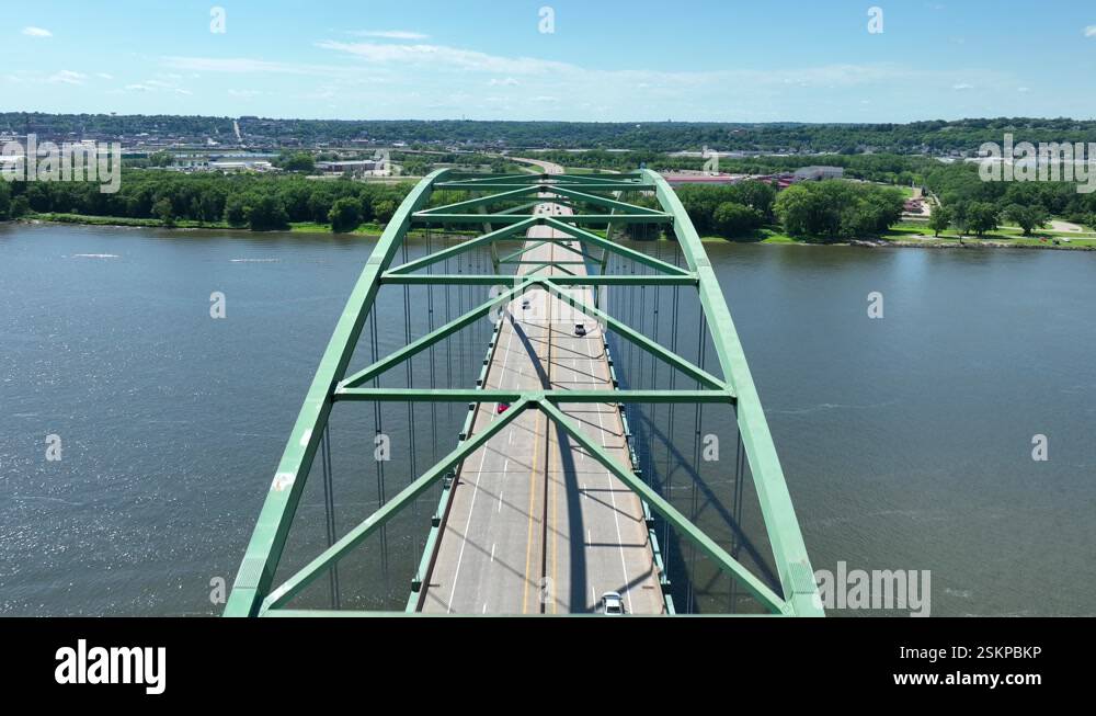 Bridge over Mississippi River. Aerial flight over curving bridge ...