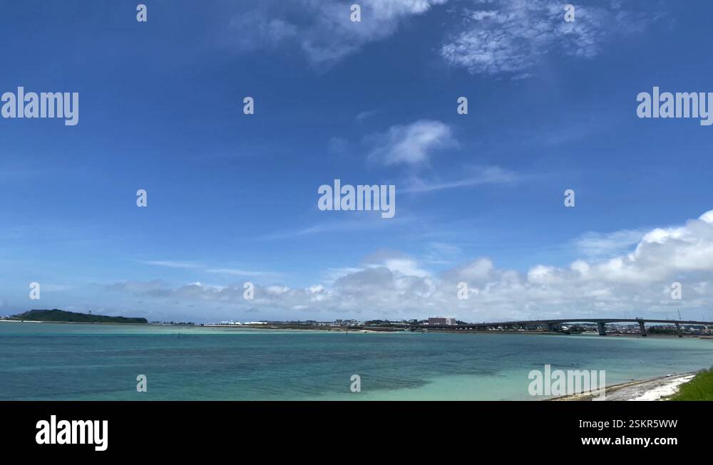 OKINAWA, JAPAN : View of Senaga island and beach in daytime. Time lapse ...