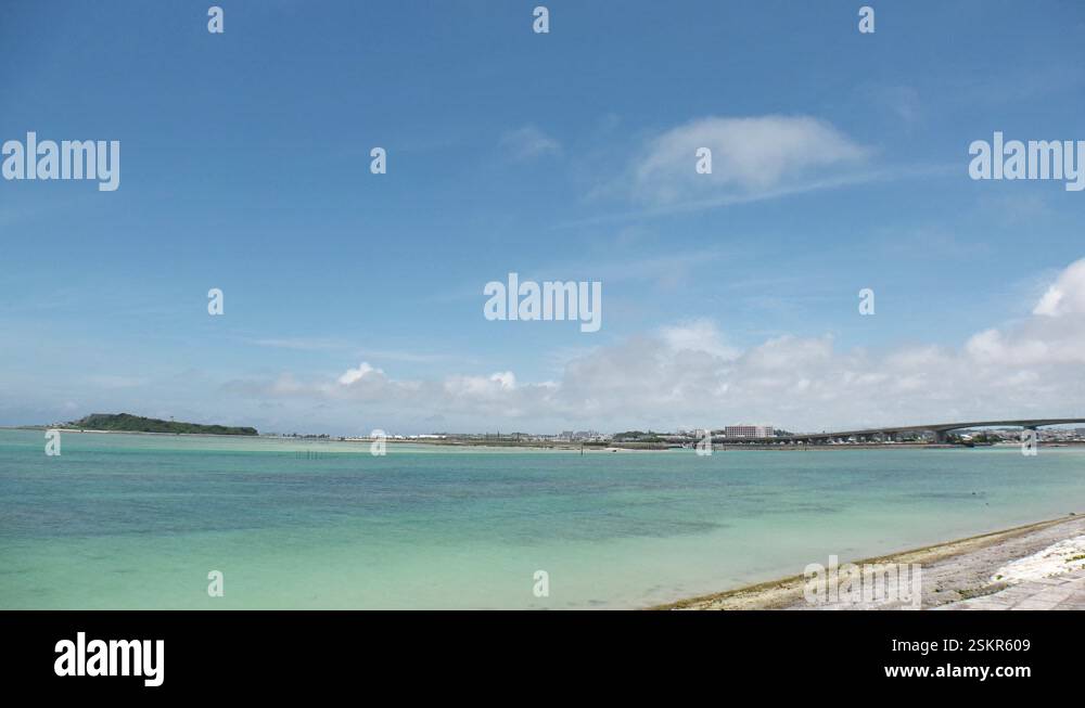 OKINAWA, JAPAN : View of Senaga island and beach in daytime. Time lapse ...