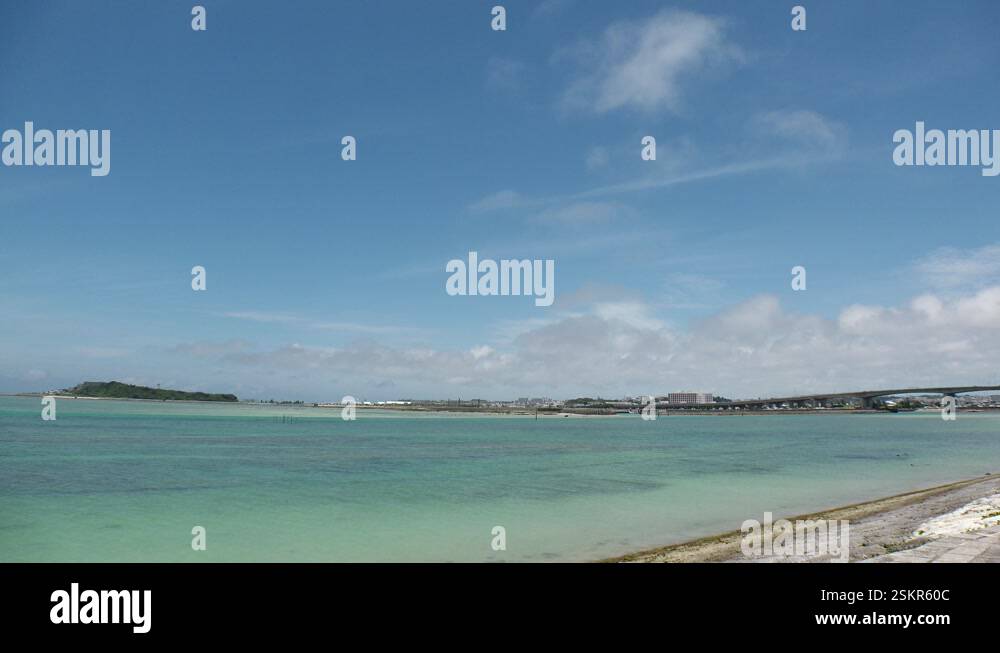 OKINAWA, JAPAN : View of Senaga island and beach in daytime. Time lapse ...