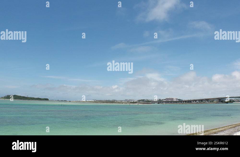 OKINAWA, JAPAN : View of Senaga island and beach in daytime. Time lapse ...
