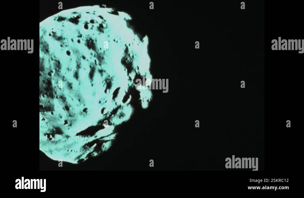 1980s: Zooming shots, photos of moons orbiting Mars. Zoom out ...
