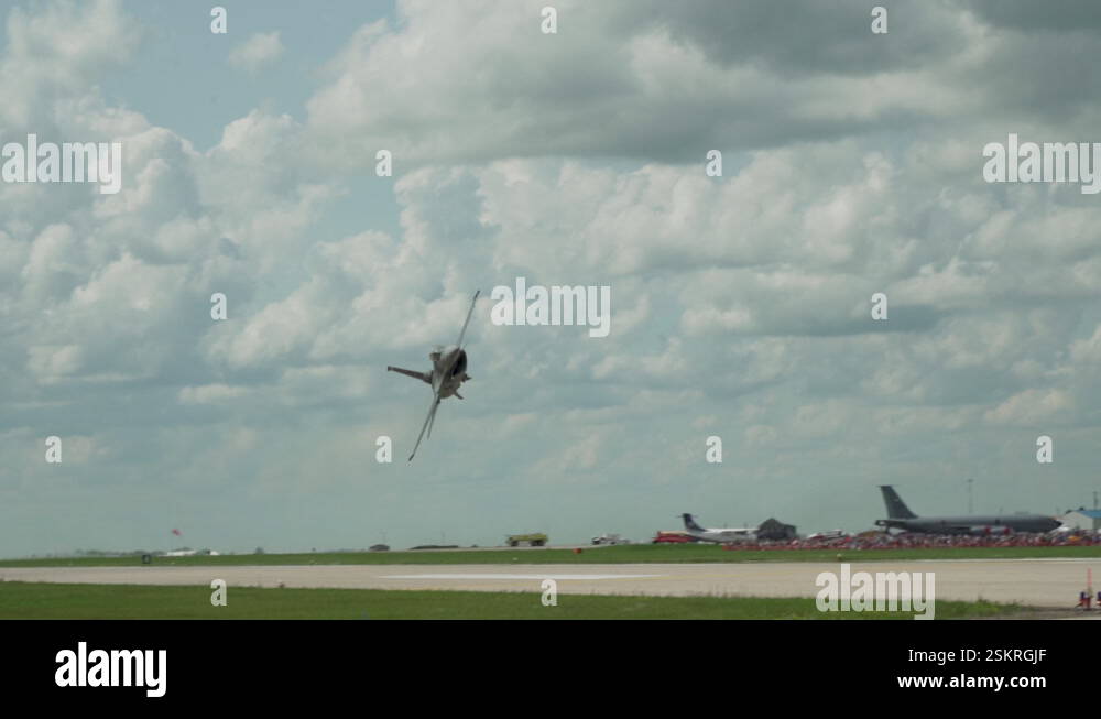 An F-16 Viper fighter jet does a low pass immediately after takeoff ...