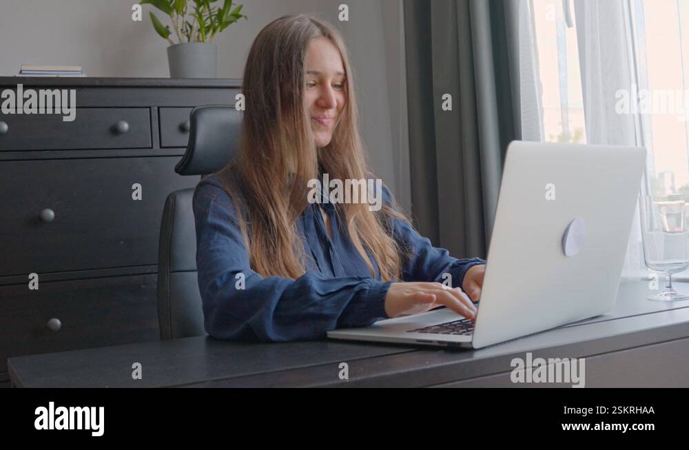 Smiling corporate woman typing Stock Videos & Footage - HD and 4K Video ...