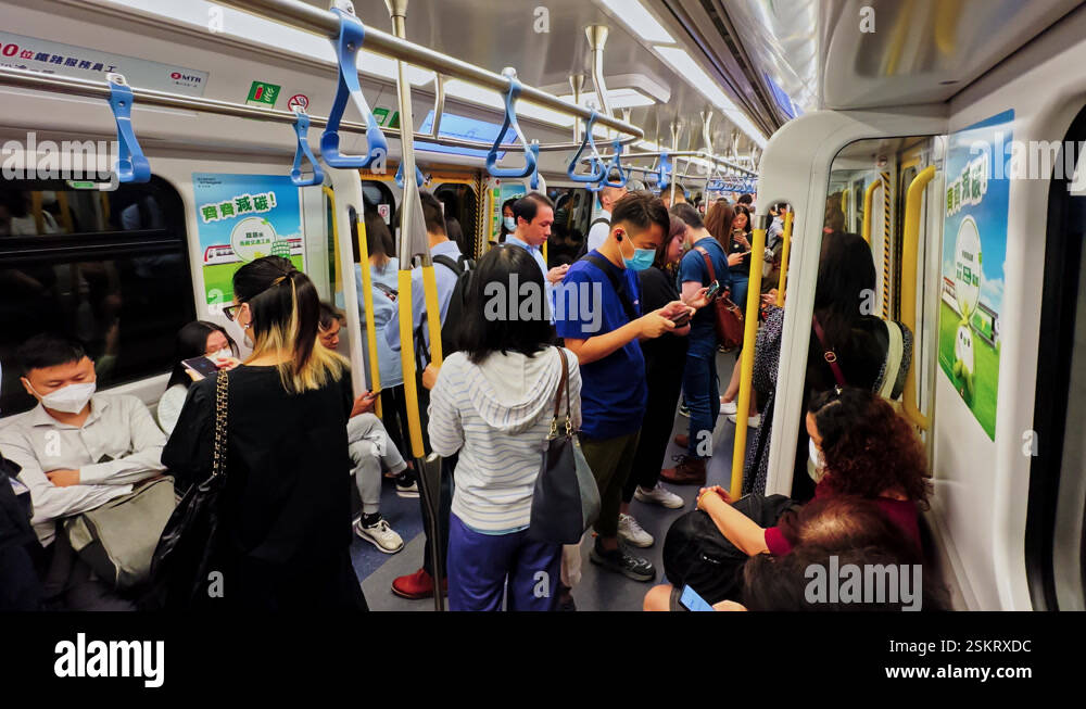 Crowded MTR Train in Hong Kong with People Packed and Wearing Face ...