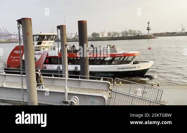 HAMBURG, GERMANY - MARCH 24, 2022: Harbour Ferry arriving at Dockland ...