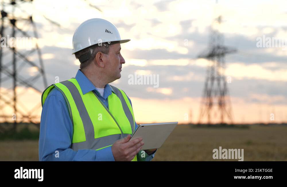 Positive engineer controls process with tablet at power transmission ...