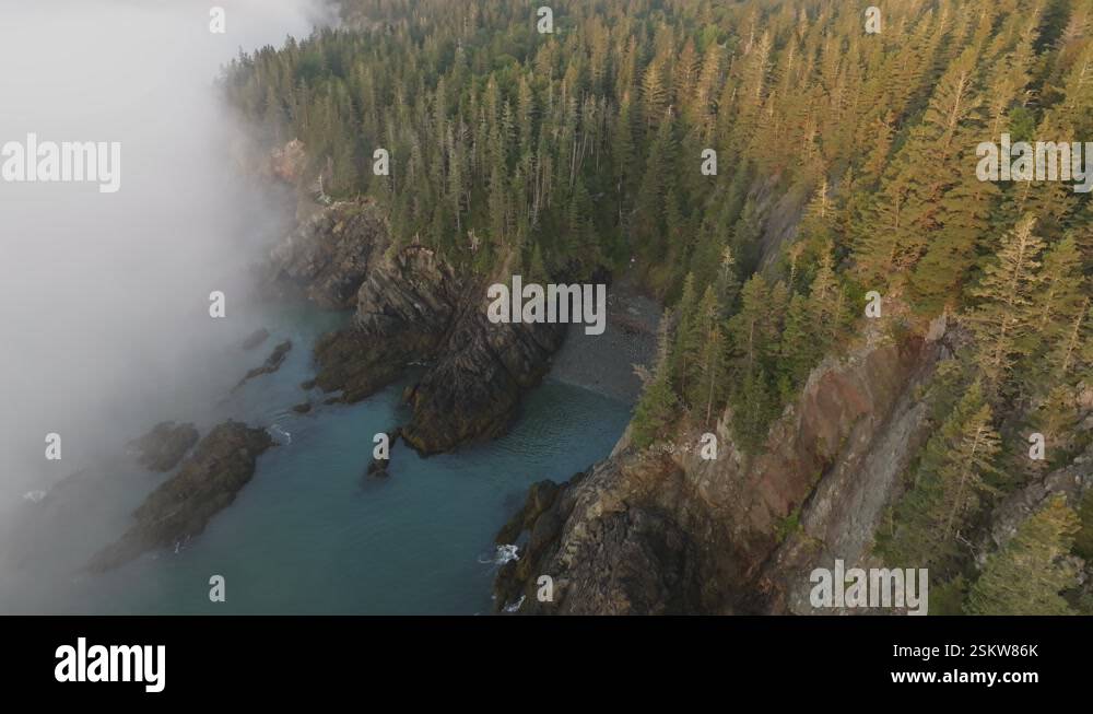 Breathtaking High Aerial Reveals Fog Bank Approaching Maine's Bold ...