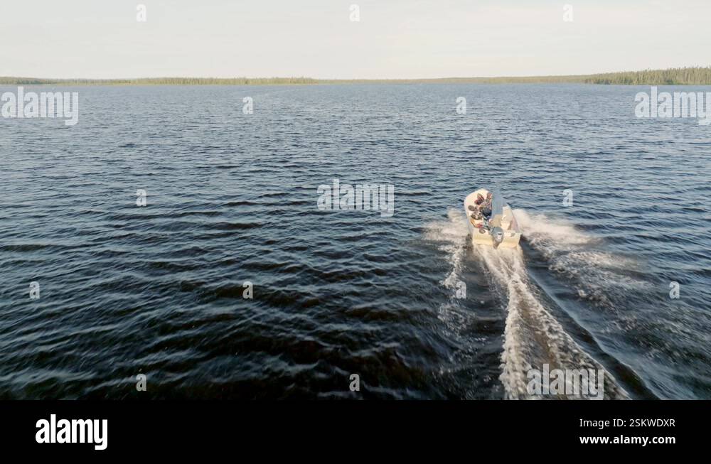 Fishing Boat Cruises Through Pristine Waters of Crook's Lake, Labrador ...