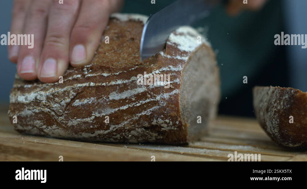 Super Slow-Motion 800fps Capture of Bread Being Sliced with Flying ...