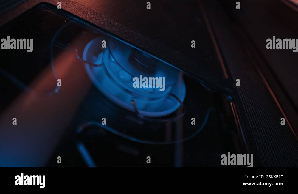 VHS mechanism inside, cassette player, magnetic head. Rotation reel ...