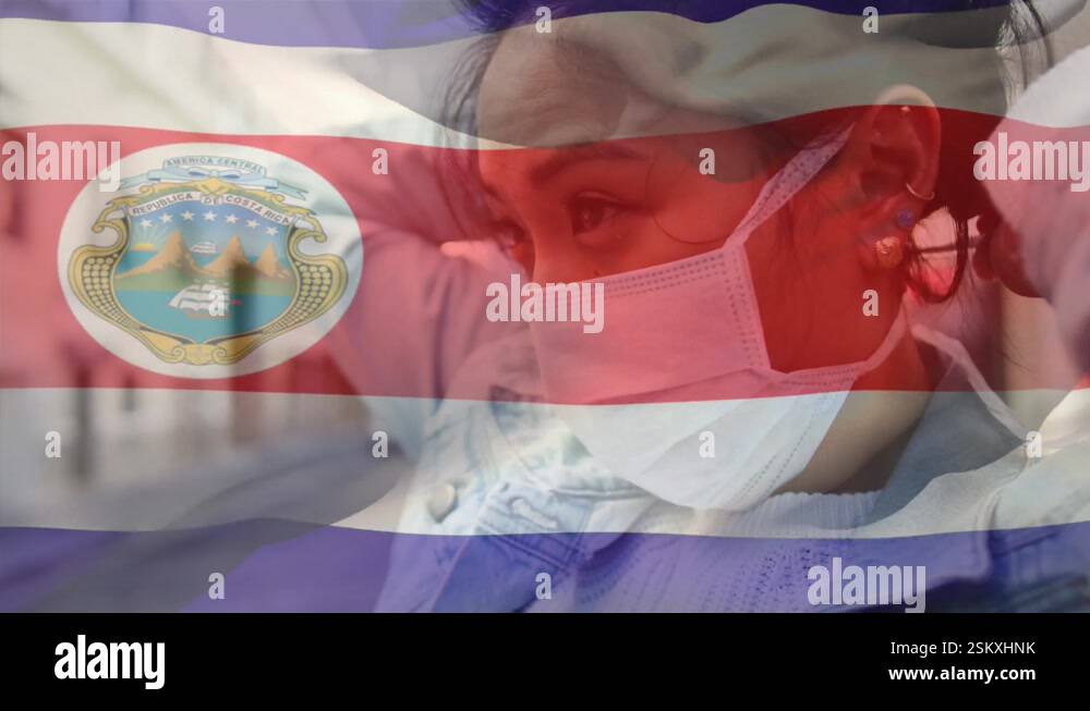 Animation of waving costa rica flag against asian woman wearing face ...