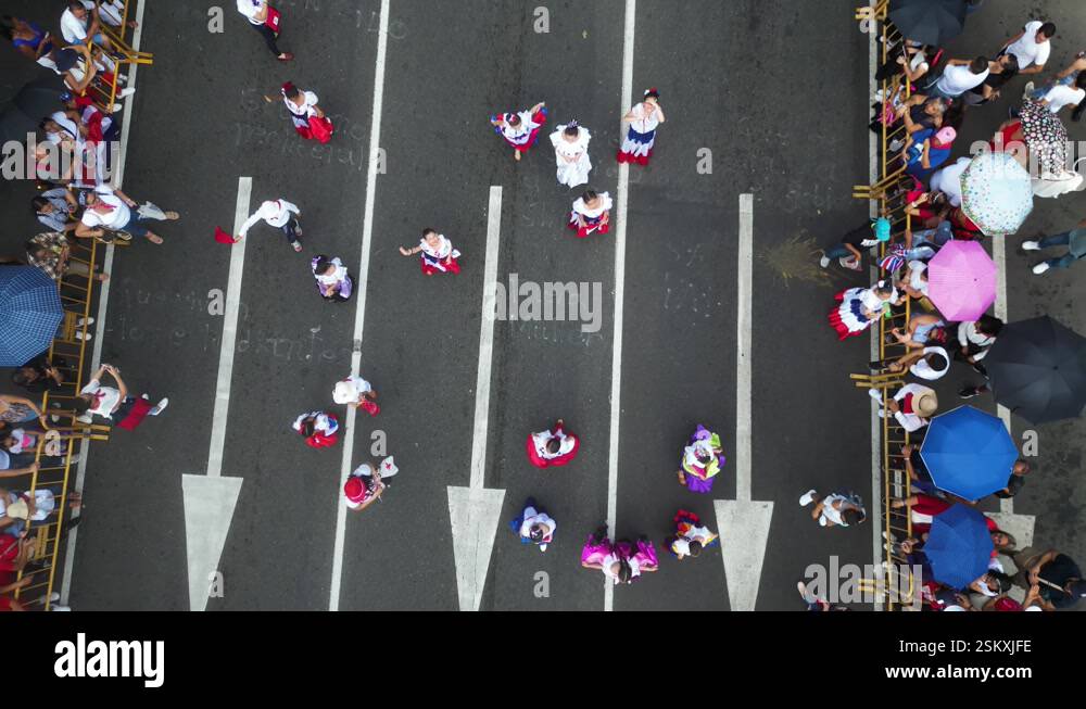 Children in Traditional Costa Rican Clothing Waving at Drone as it ...