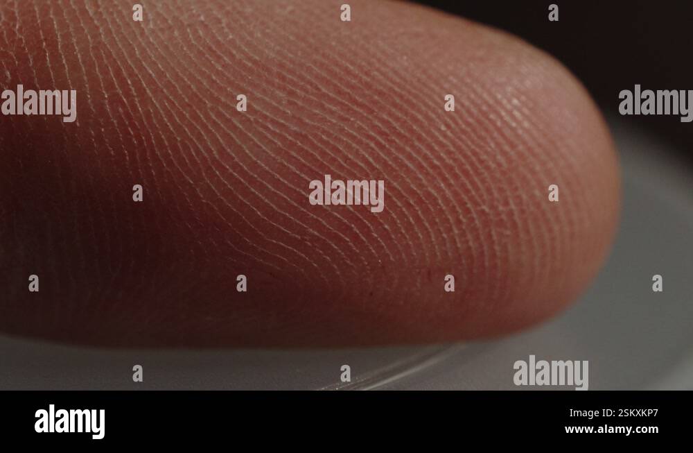 Detailed macro of fingerprint on index finger Stock Video Footage - Alamy
