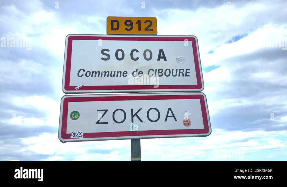 Bilingual french and basque road sign at the entrance of the district ...