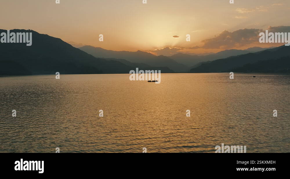 Evening Golden Hour peaceful Pokhara Nepal Phewa Lake. Tourists are ...