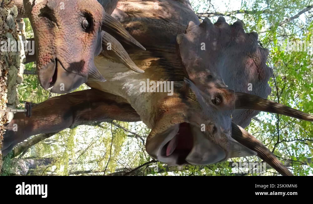 Scary, strange dinosaurs. Predatory dinosaurs stand in the middle of ...