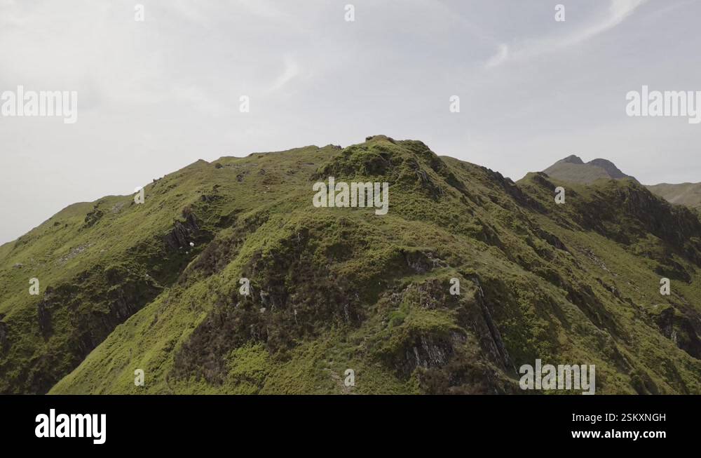 Flight up to the top of a mountain Stock Video Footage - Alamy