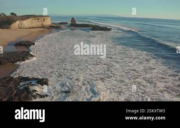 Aerial view of beautiful Four Mile Beach and cliffs of Pacific Ocean ...