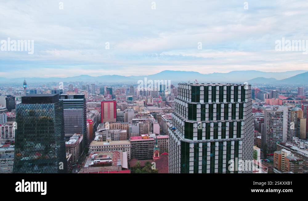 Flyover of the Centennial Tower in contrast with the old architecture ...