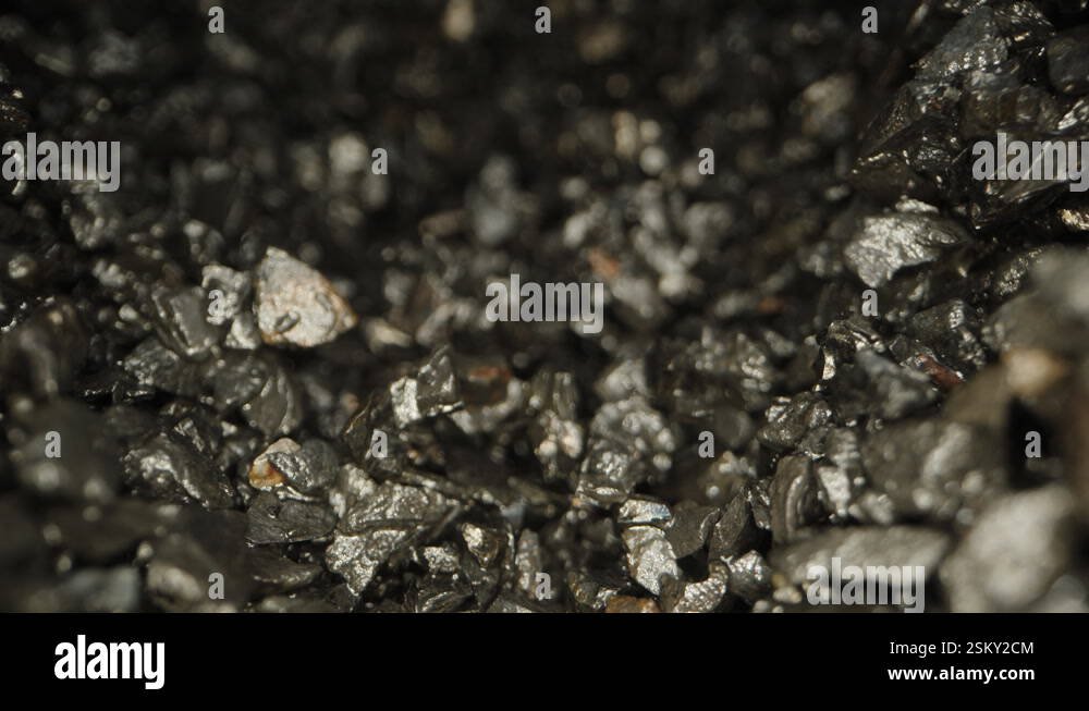 The concept of coal mining, inside a coal mine. Macro shot. Dolly ...