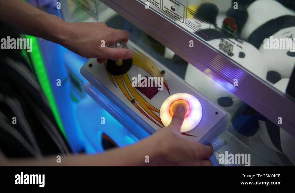 Classic Claw Machine Arcade Game; Left Hand Using Joystick And Right Thumb Stock Video Footage ...