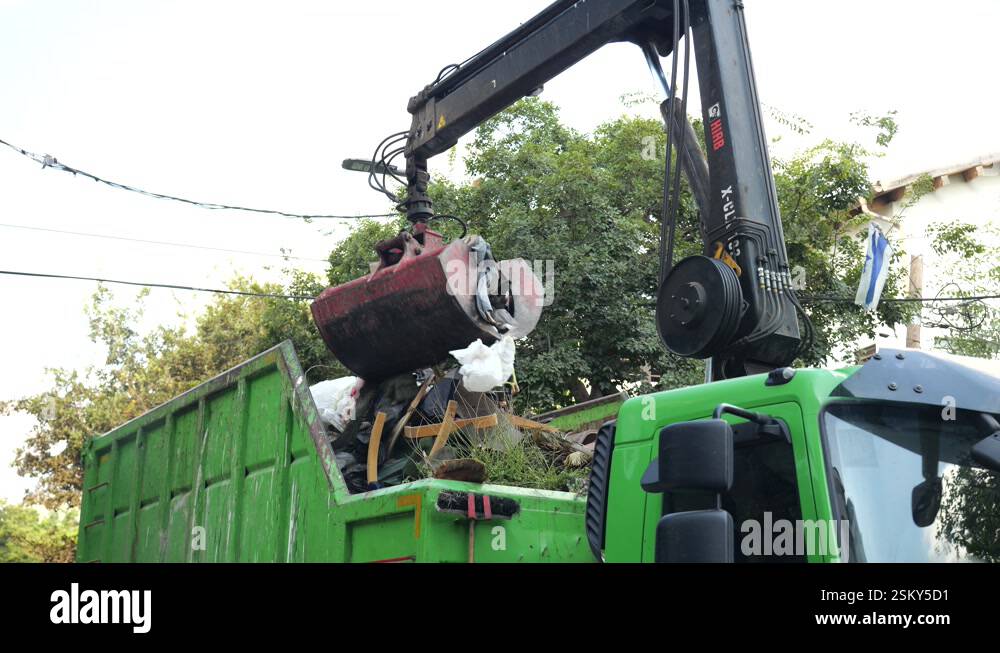 Waste disposal vehicle collecting plastic Stock Videos & Footage - HD ...