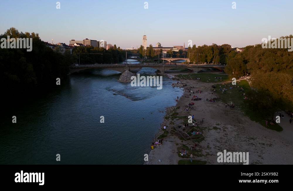 Fantastic aerial top view flight Munich river Isar beach bridge Park ...