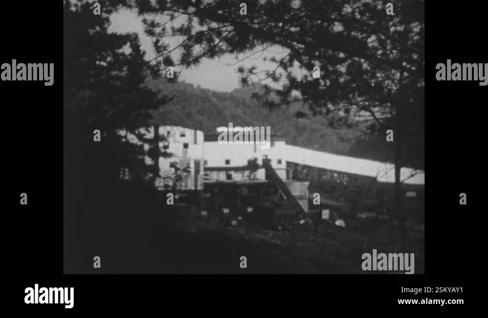 1950s: Building to load rail cars with coal. Railroad sign for "David ...