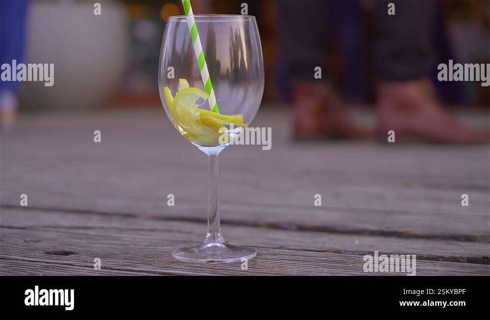 Close up empty of alcohol cocktails glass at wooden floor at party ...