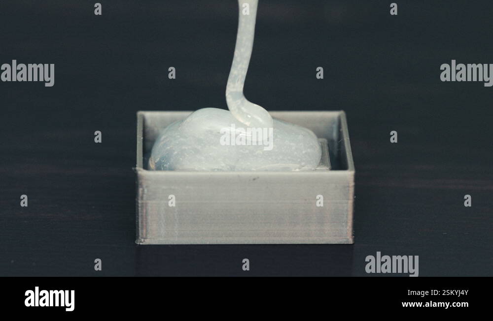 Pouring Liquid Silicone into 3D Printed Molds: Craftsmanship Close-up ...