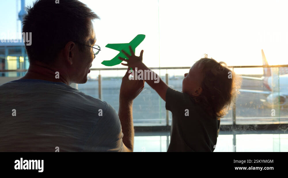Father mimics airplane takeoff to entertain his excited baby at ...
