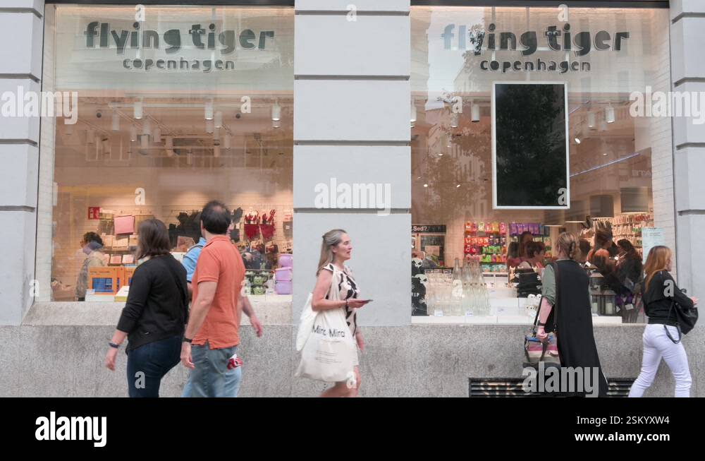 Women window shopping at the Danish gift chain, Flying Tiger Copenhagen ...