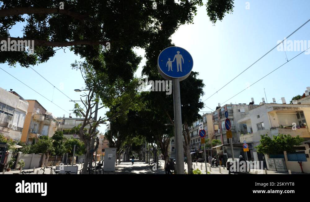 Blue signage warning road users of impending pedestrian path. Safety ...