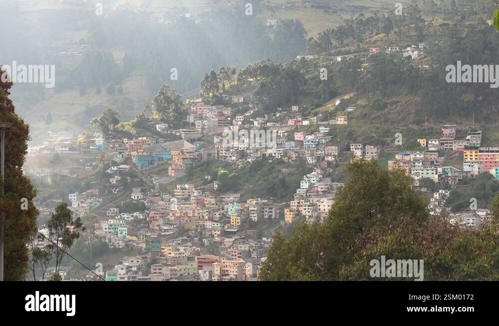 Light Breaks through the Clouds in Poor District of Quito in Ecuador ...