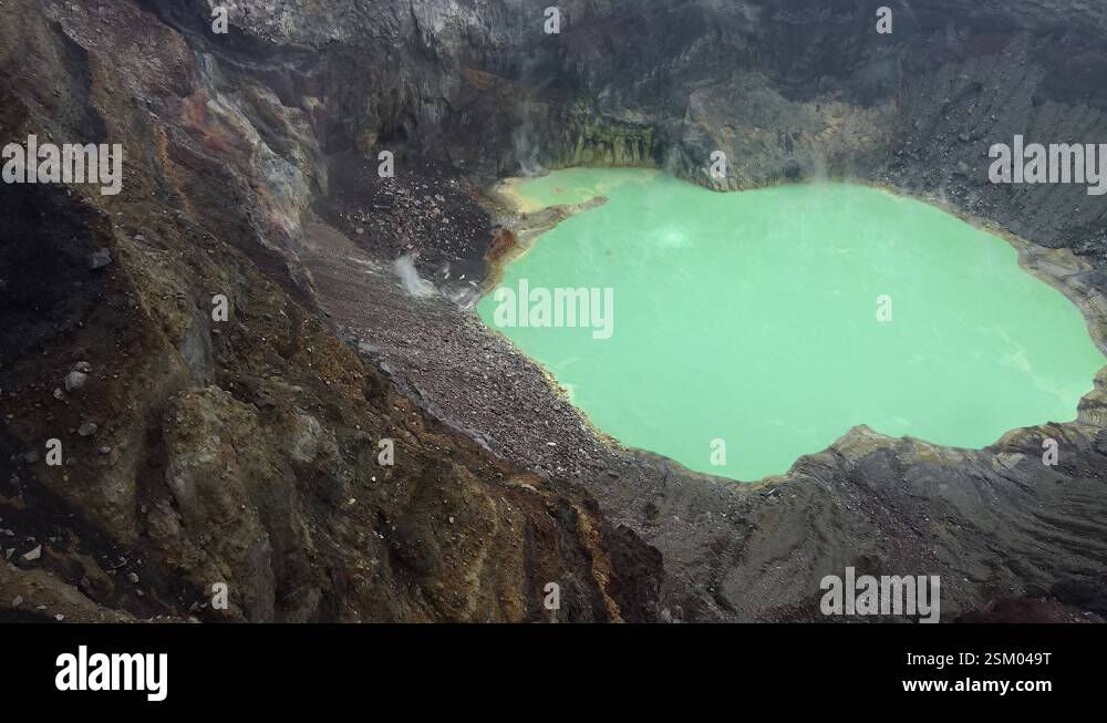 Rocky strata revealed in walls of deep summit Santa Ana Volcano crater ...